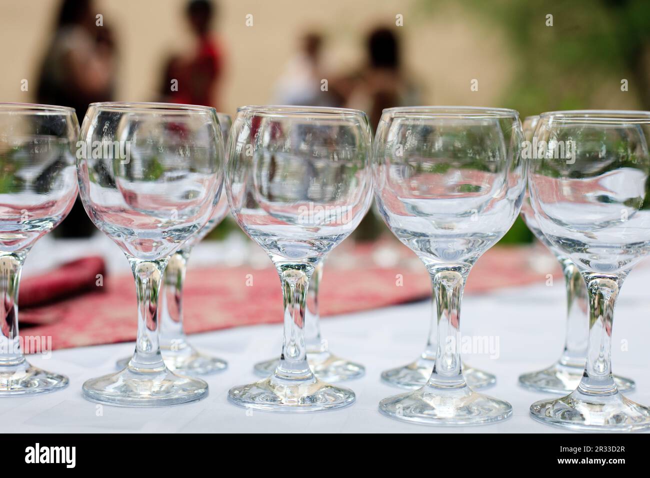 Glasses in rows outdoors Stock Photo - Alamy