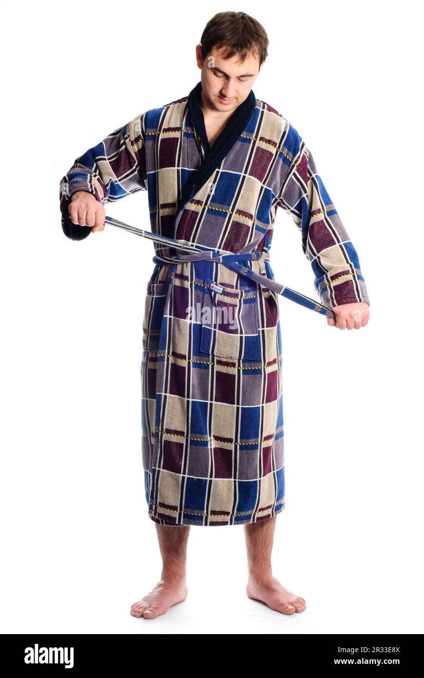 Man wearing bathrobe standing hi-res stock photography and images - Alamy