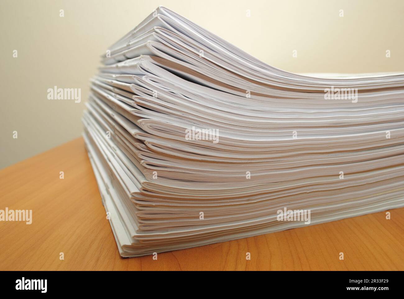 Stack of white journals Stock Photo - Alamy