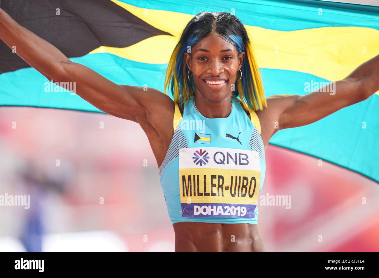 Shaunae Miller-Uibo with his country's flag in the 400m at the 2019 ...