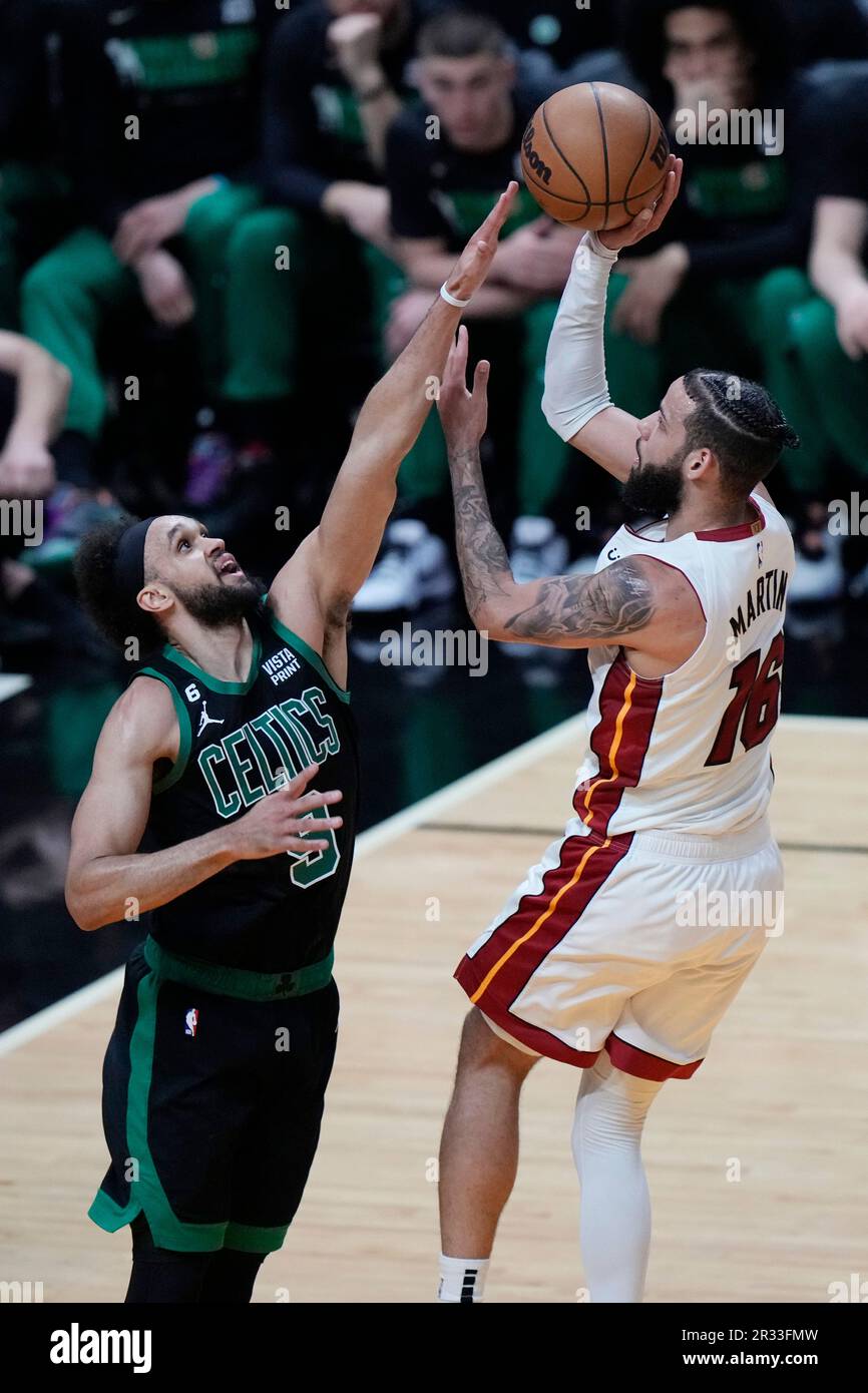 Miami Heat forward Caleb Martin (16) aims to score as Boston Celtics ...