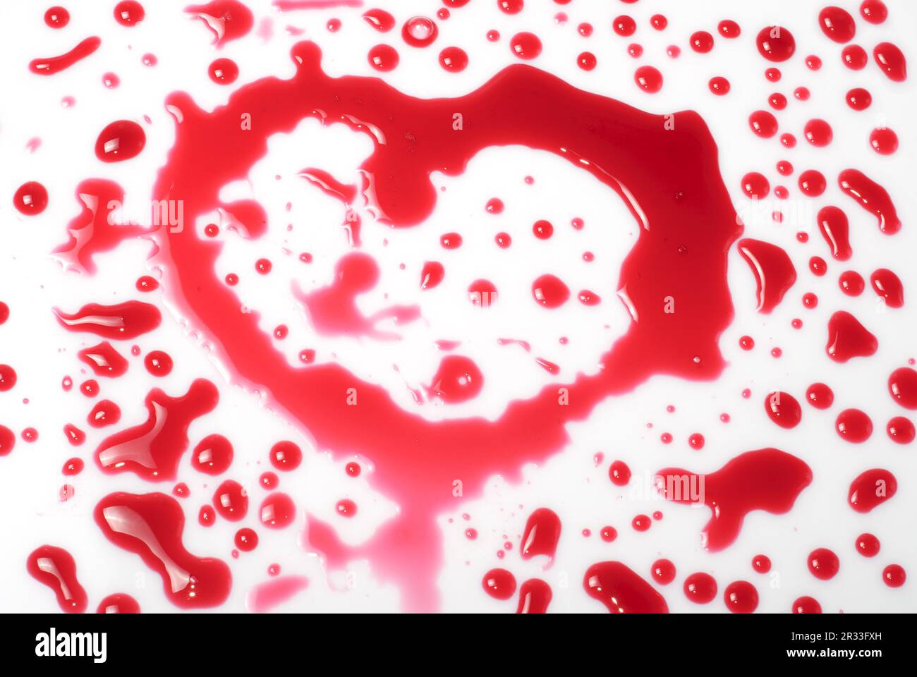 Red drops heart Stock Photo - Alamy