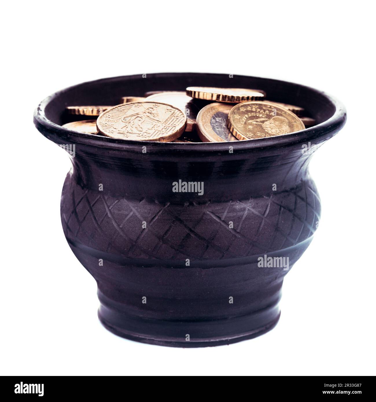 Pot with golden coins Stock Photo - Alamy