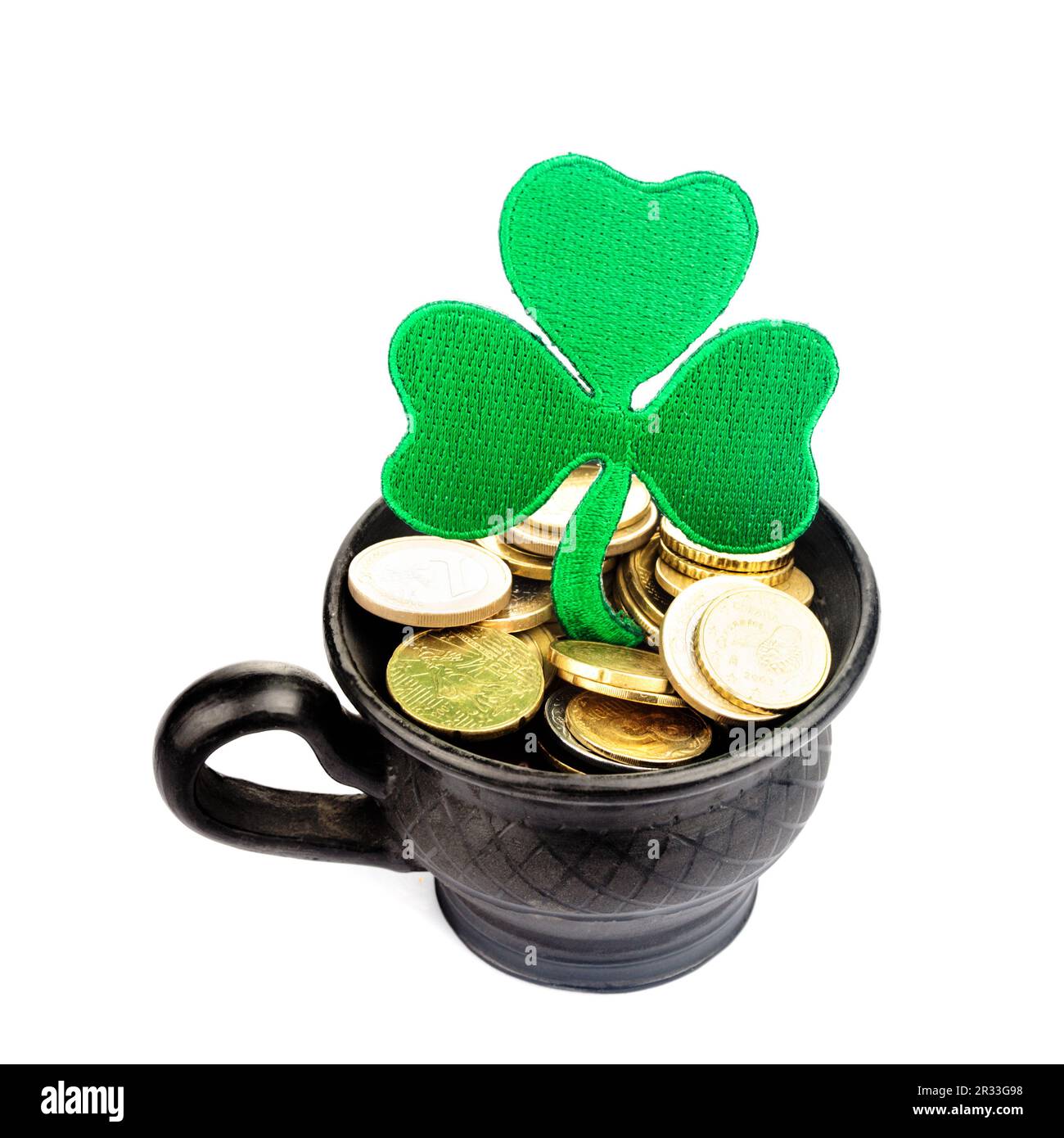 Pot with golden coins Stock Photo - Alamy