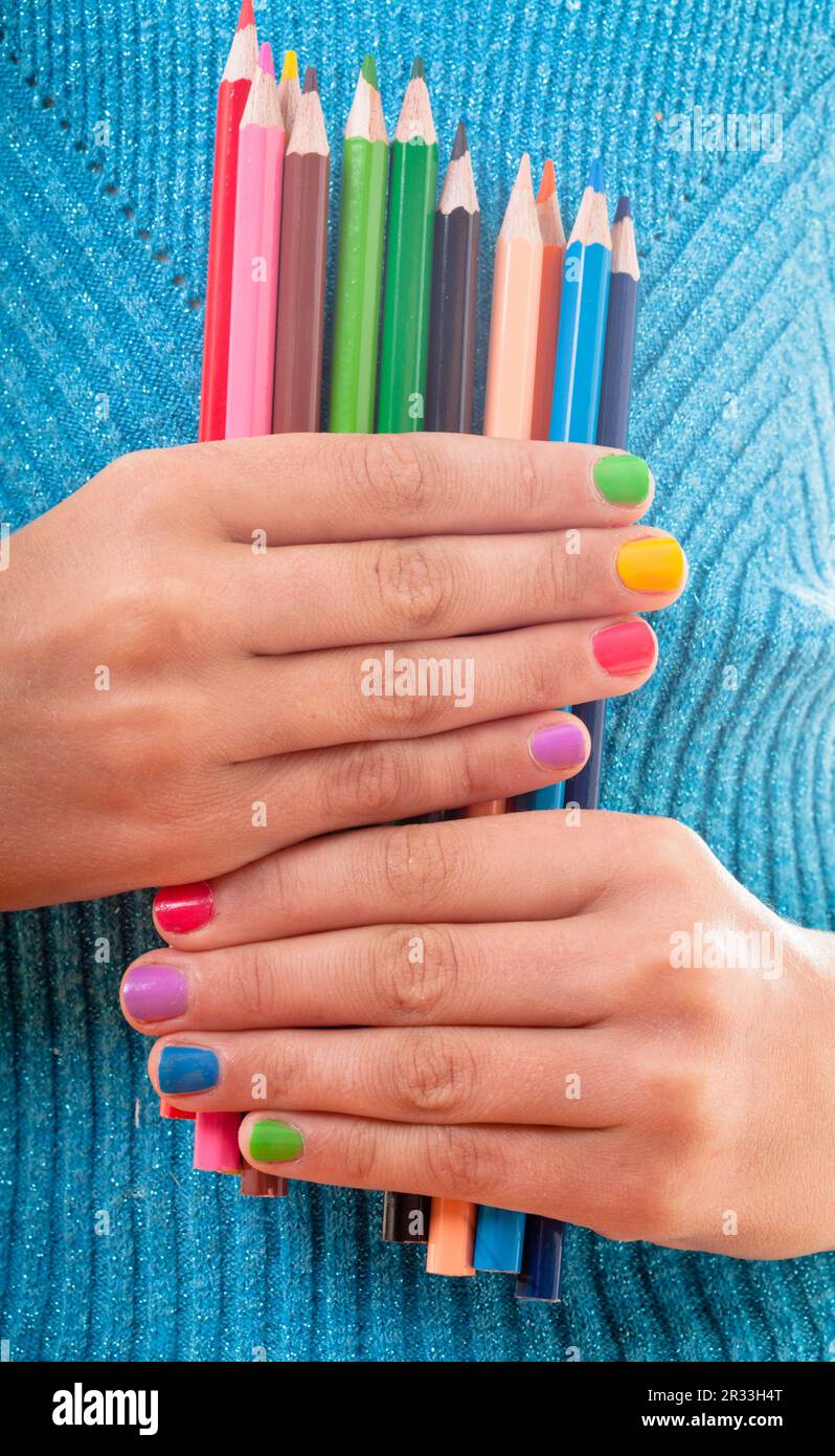 Holding up pencils hi-res stock photography and images - Alamy