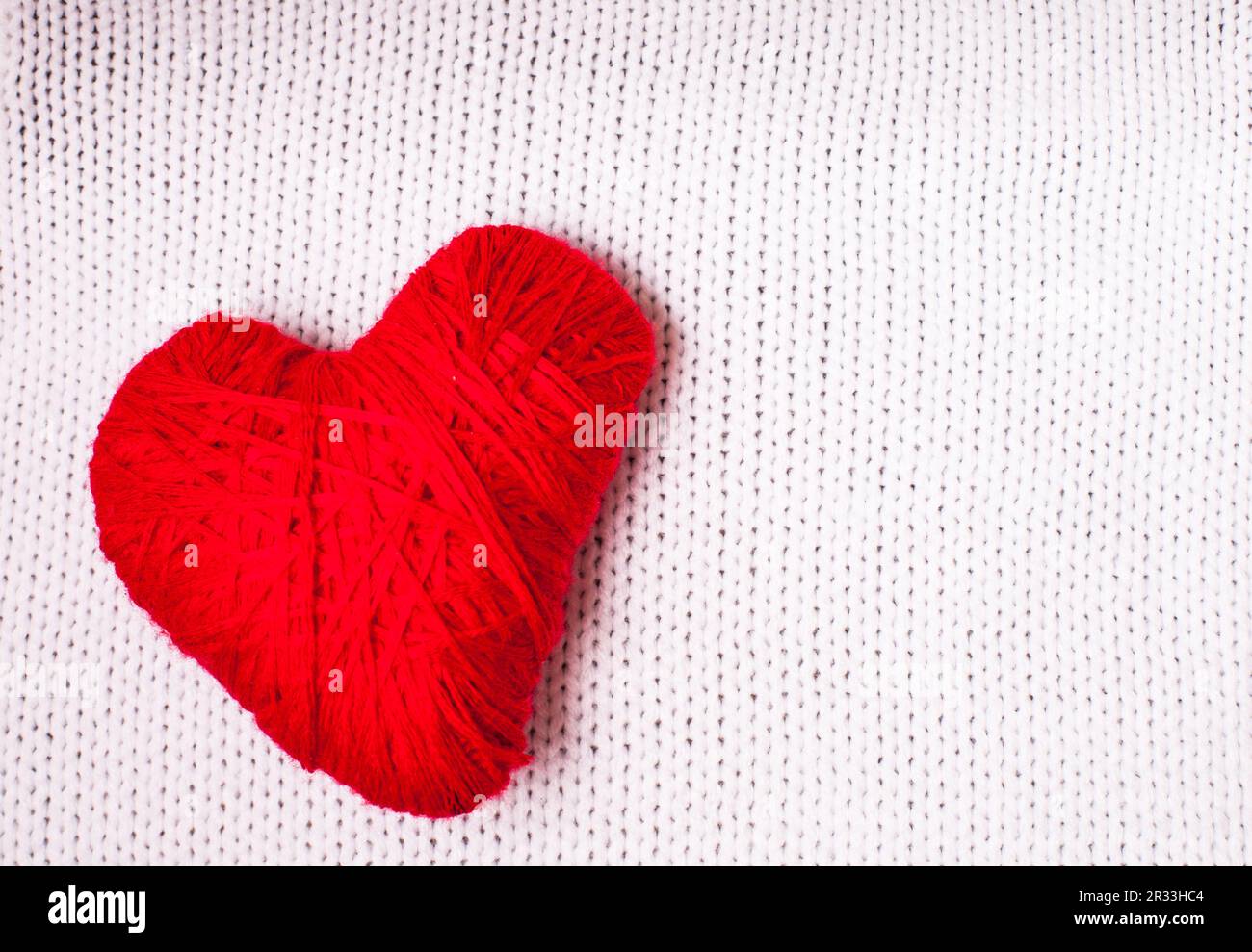Red thread heart Stock Photo - Alamy