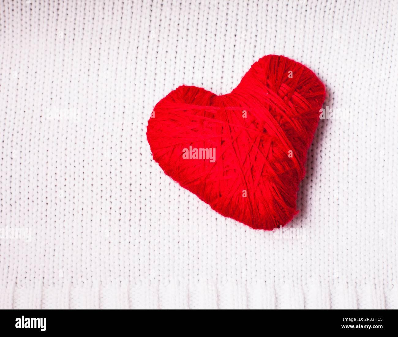 Red thread heart Stock Photo - Alamy