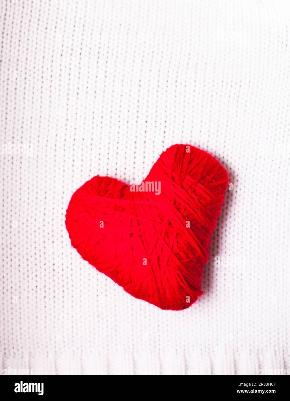 Red thread heart Stock Photo - Alamy