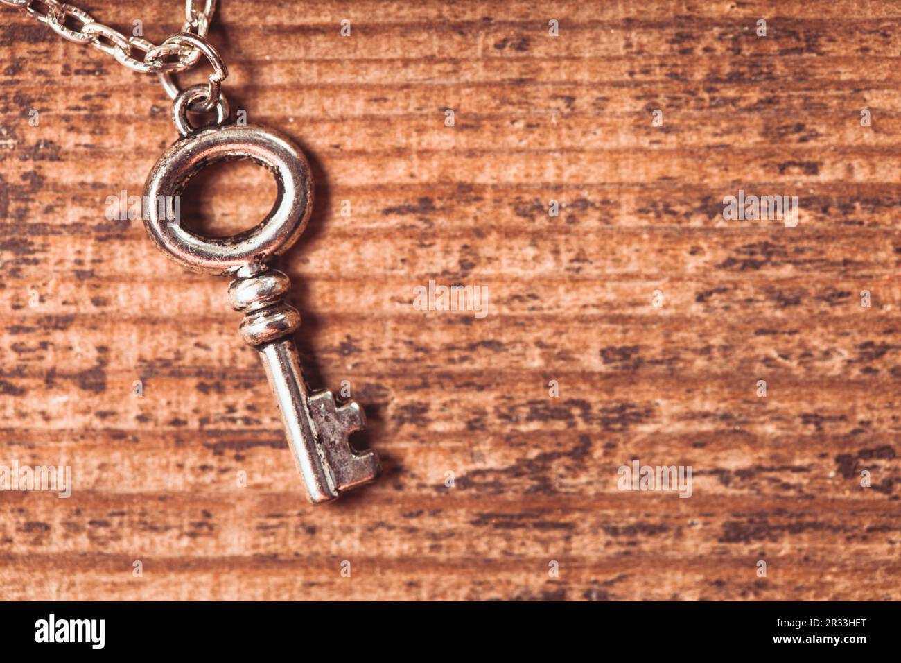 Vintage key with chain hi-res stock photography and images - Alamy