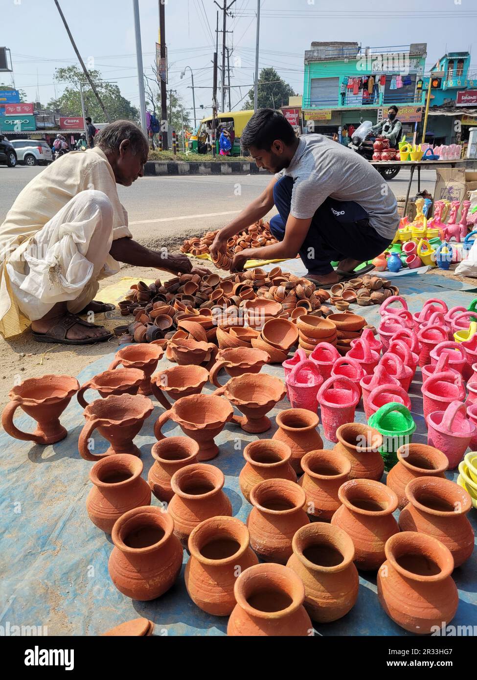 Two man selling Diwali items Stock Photo - Alamy