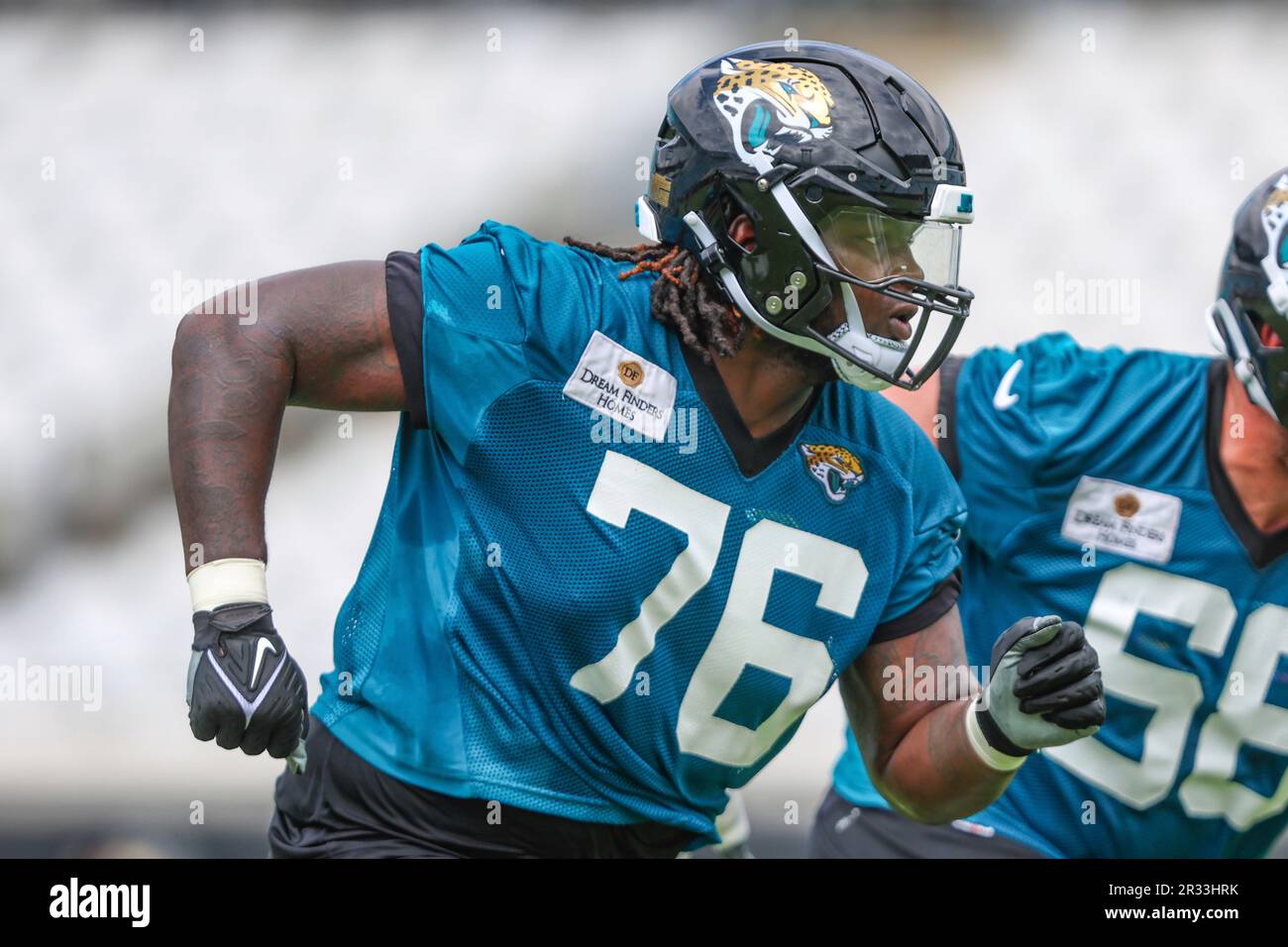Jacksonville Jaguars offensive tackle Anton Harrison (76) sets a block ...