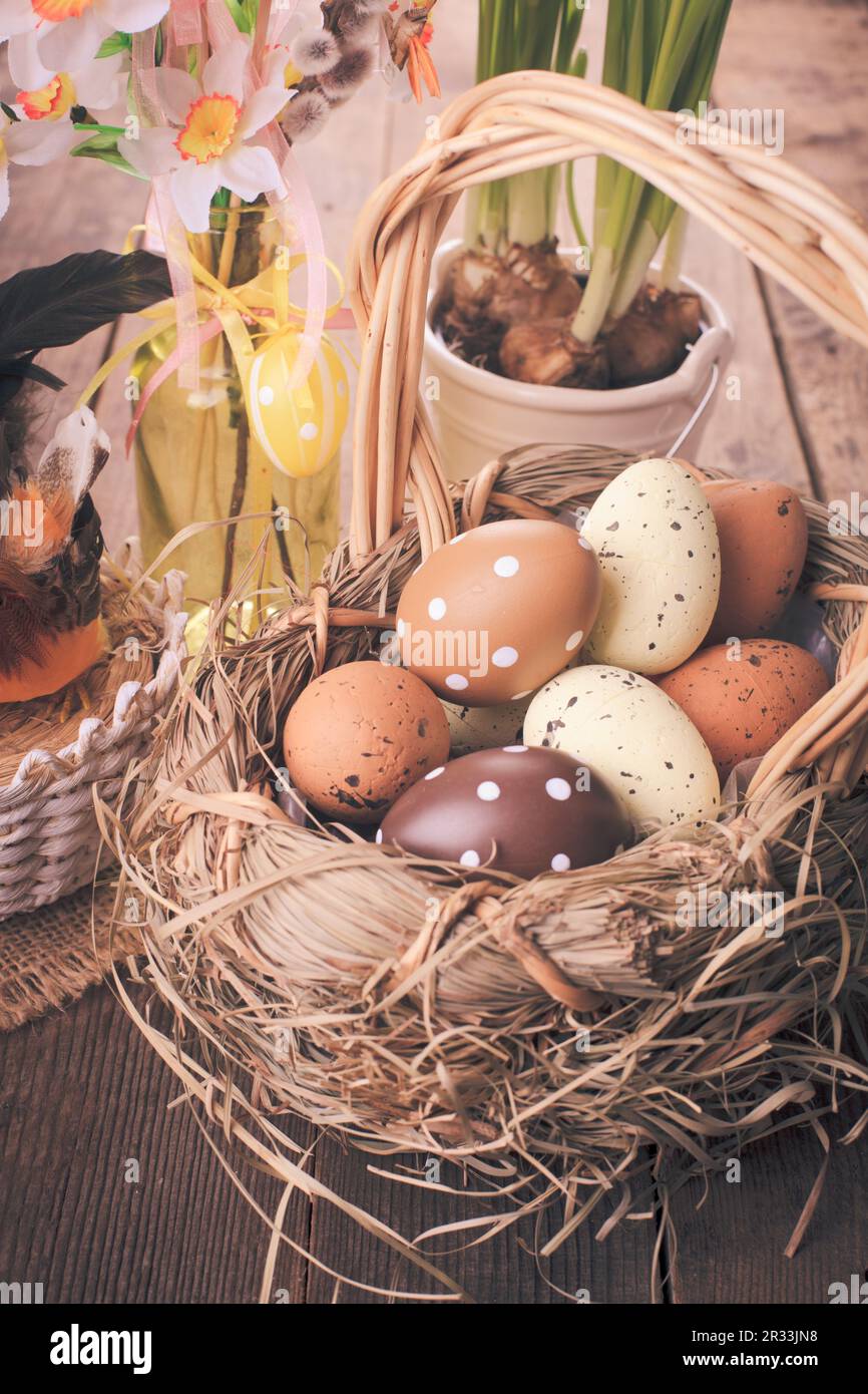 Easter eggs in basket Stock Photo - Alamy
