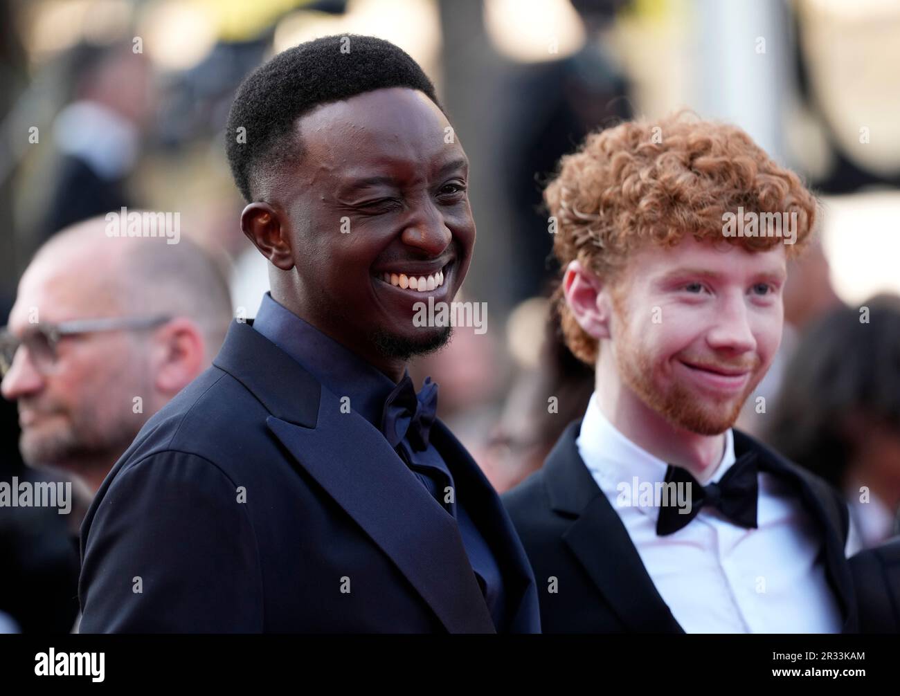 Ahmed Sylla, left, and Tom Menanteau pose for photographers upon ...