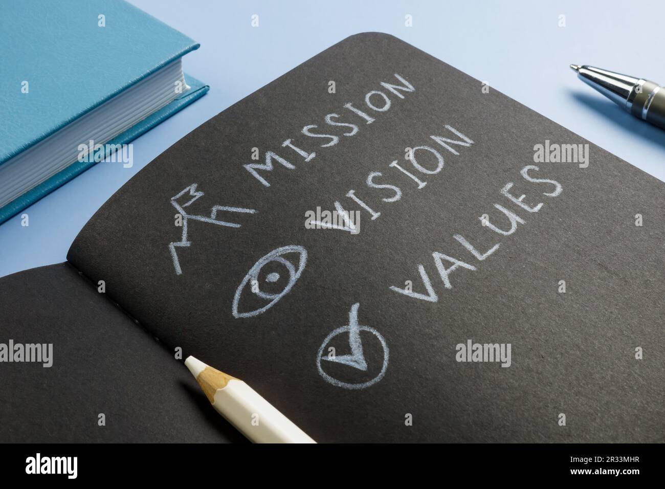 Handwritten words mission, vision and values on the page Stock Photo ...