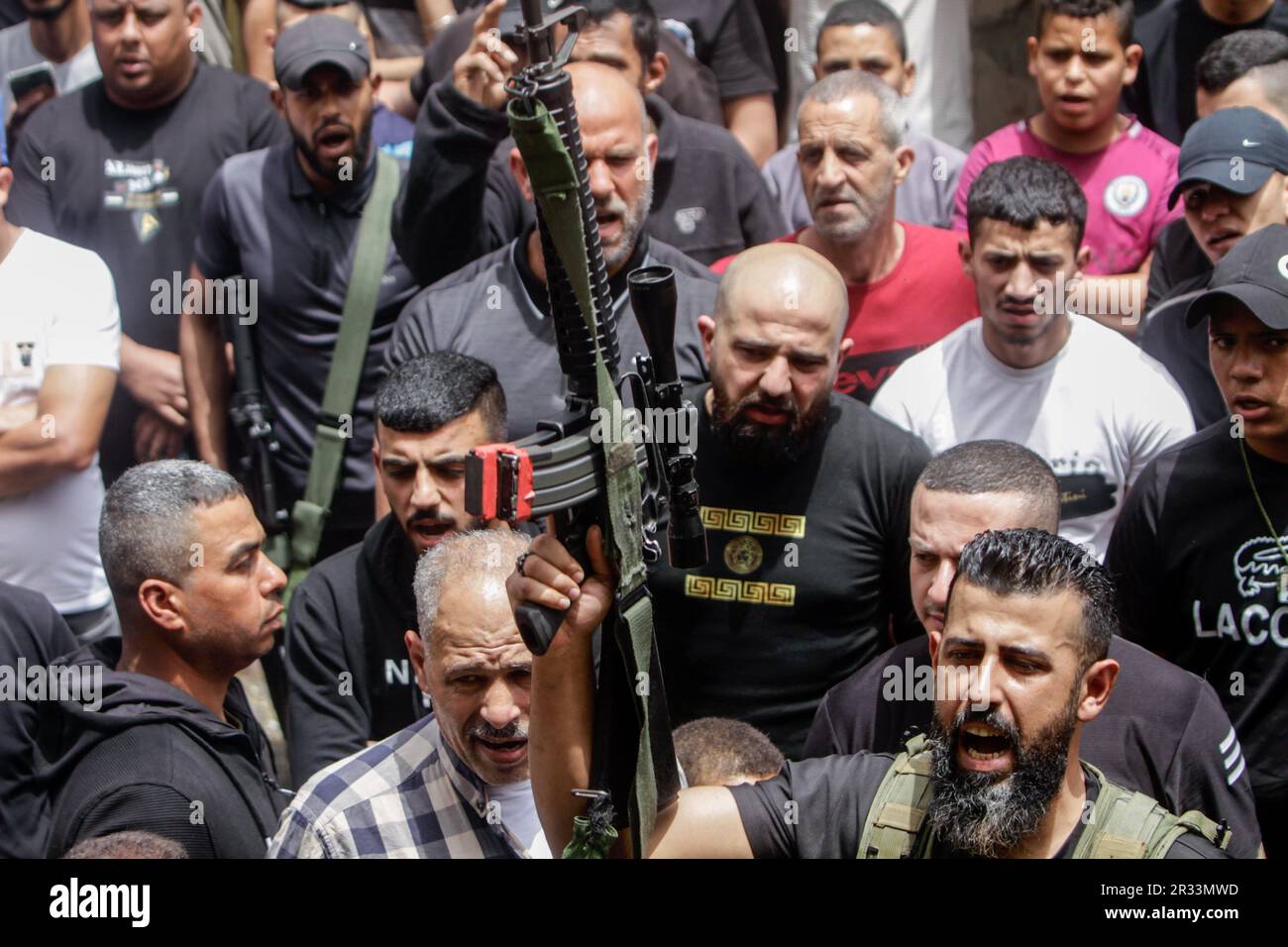 Nablus, Palestine. 22nd May, 2023. Gunmen take part in the funeral of ...