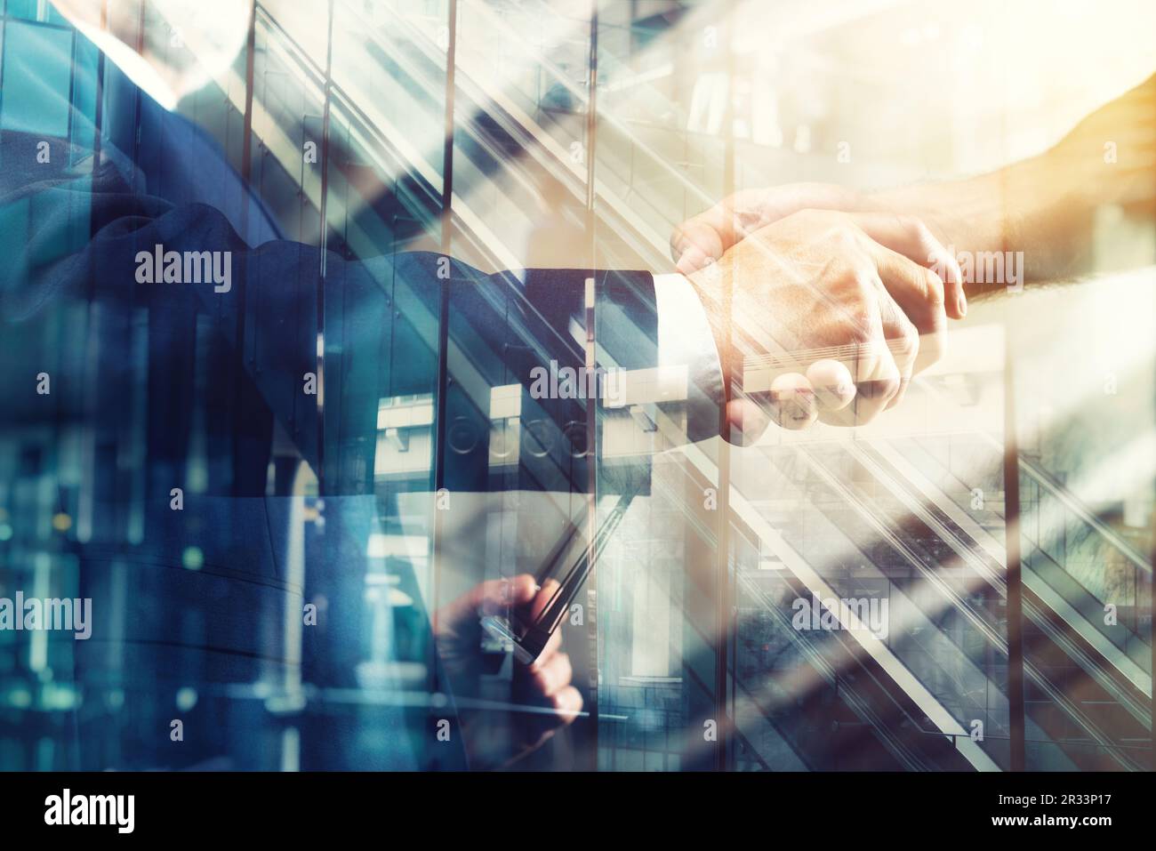 Team of workers reaches an agreement. Double exposure with light effect ...