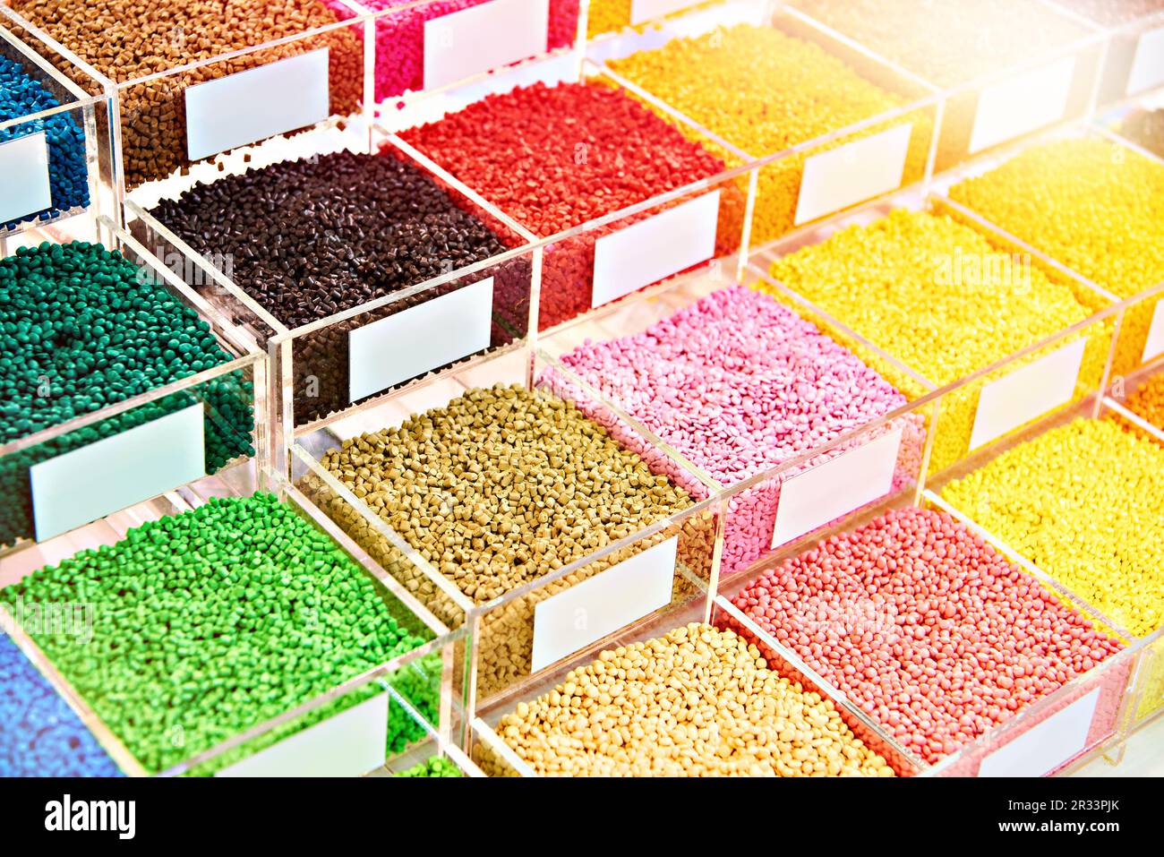 Colorful plastic granular polymer on exhibition Stock Photo - Alamy