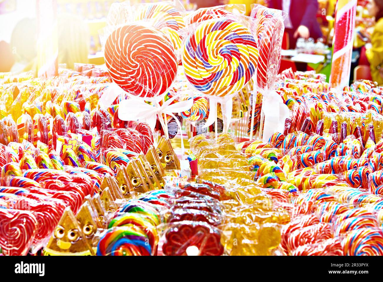 Colored caramel lollipops in a pastry shop Stock Photo - Alamy