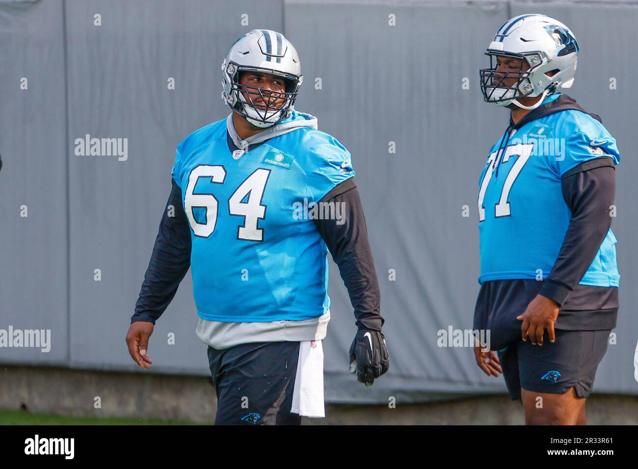 Carolina Panthers offensive lineman Justin McCray (64) talks to guard ...
