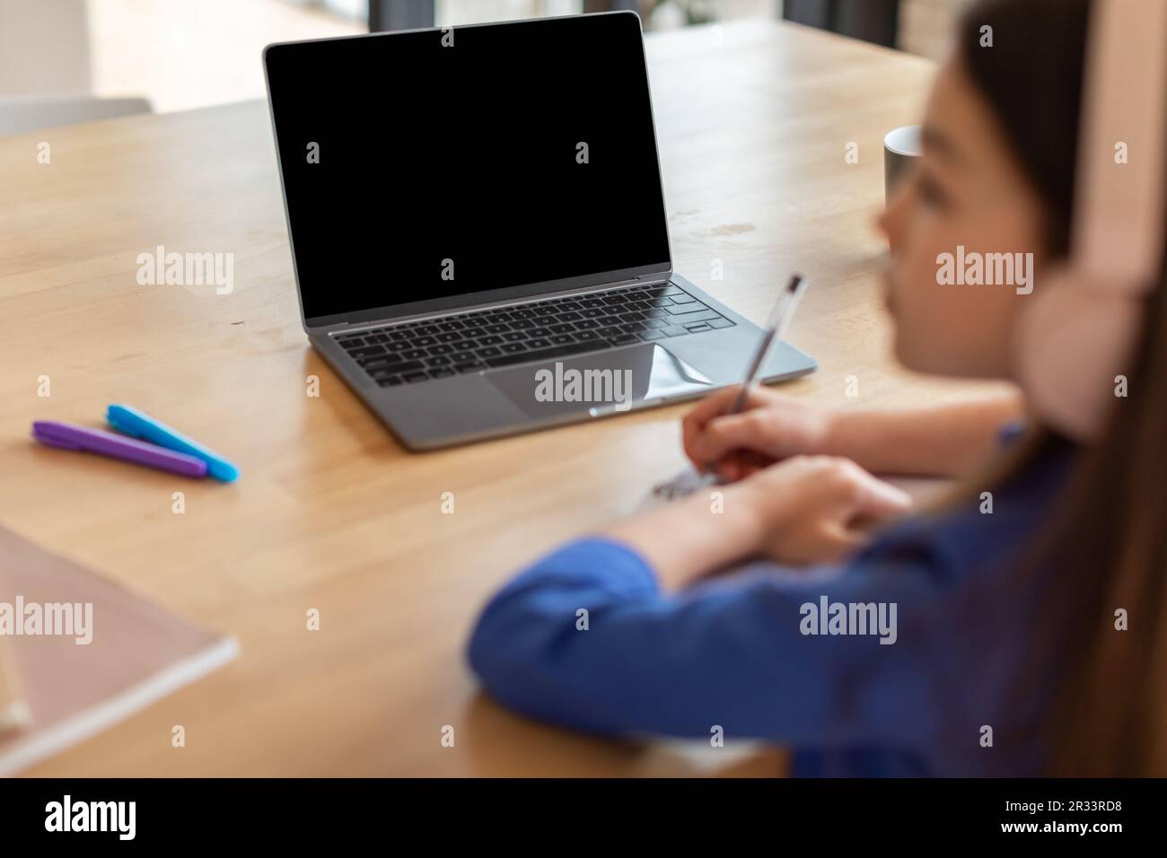 Schoolgirl Learning Taking Notes Sitting Near Computer Empty Screen ...