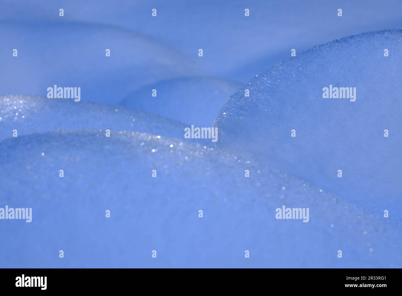 Snow shapes and hills light and shadow Stock Photo - Alamy