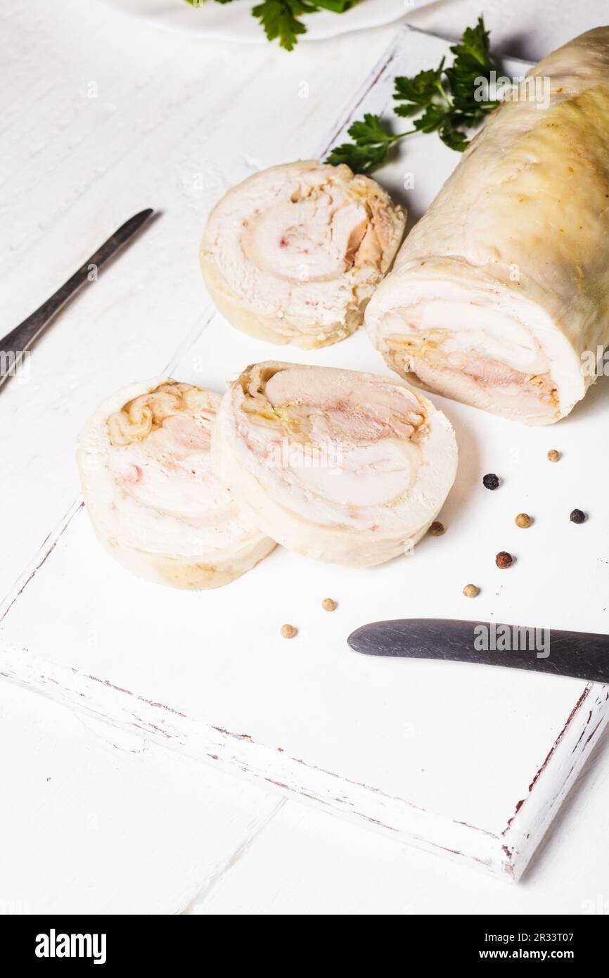A baked chicken roll Stock Photo - Alamy