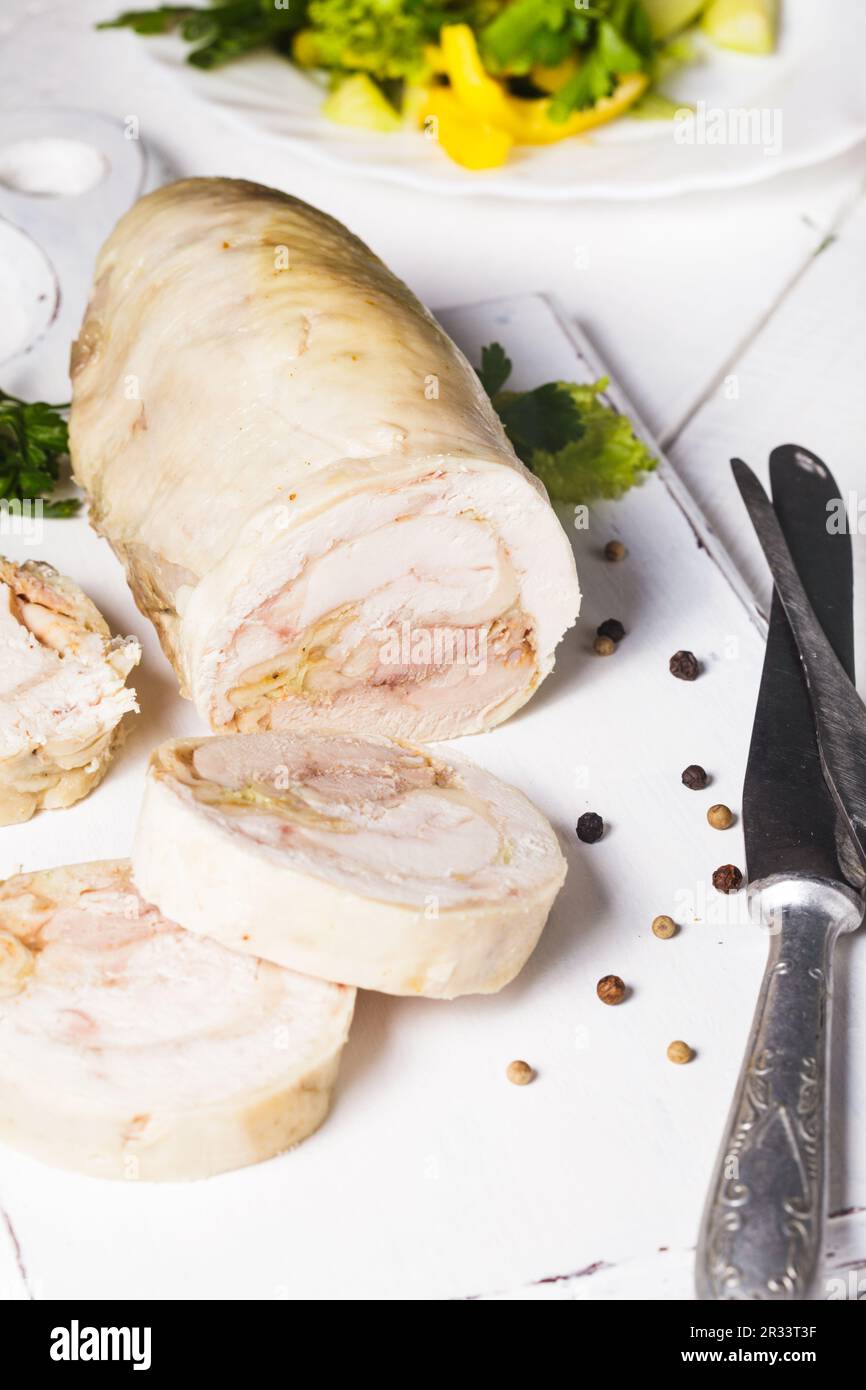A baked chicken roll Stock Photo - Alamy