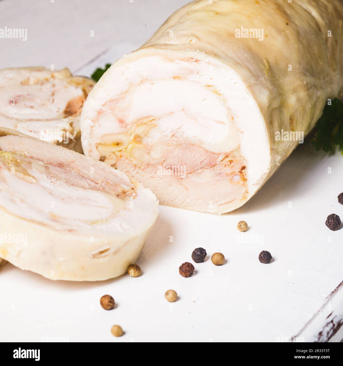 A baked chicken roll Stock Photo - Alamy