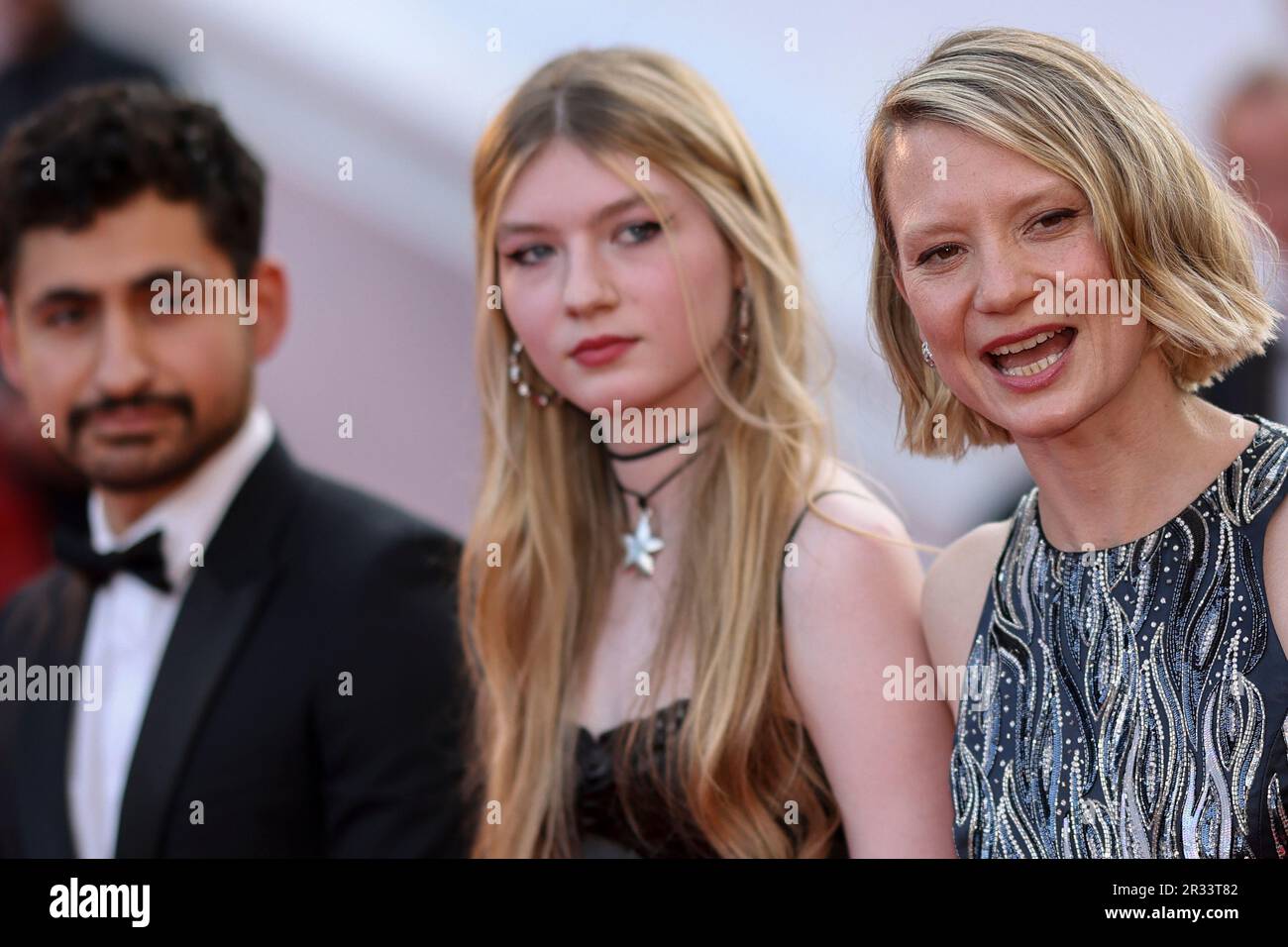 Amir El-Masry, from left, Florence Baker and Mia Wasikowska pose for photographers upon arrival ...