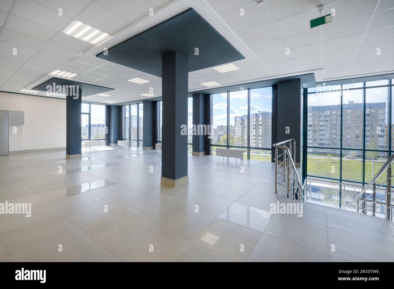 empty modern hall room with columns, doors and panoramic windows Stock Photo - Alamy