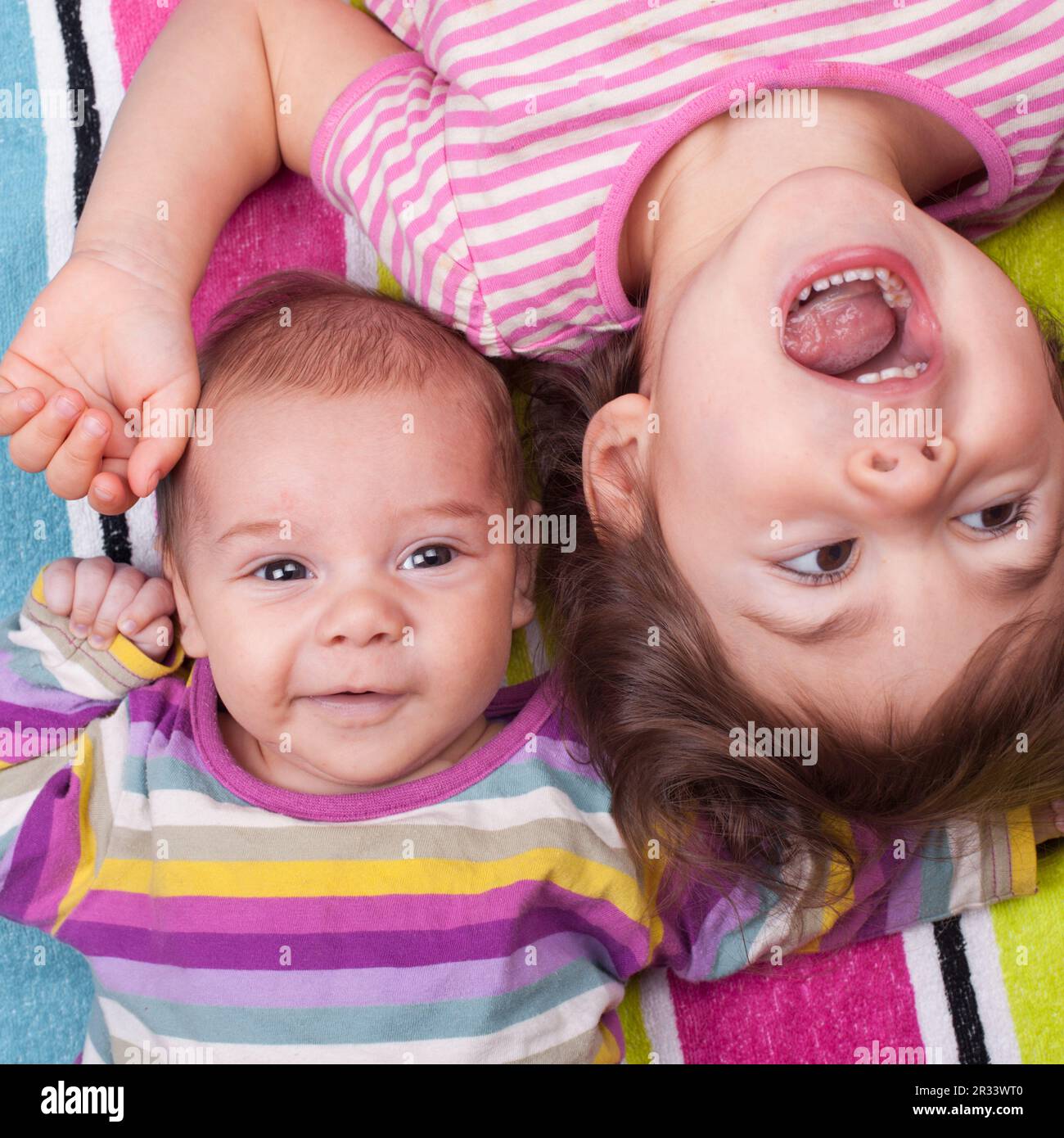 Brother sister sibling playing together hi-res stock photography and ...