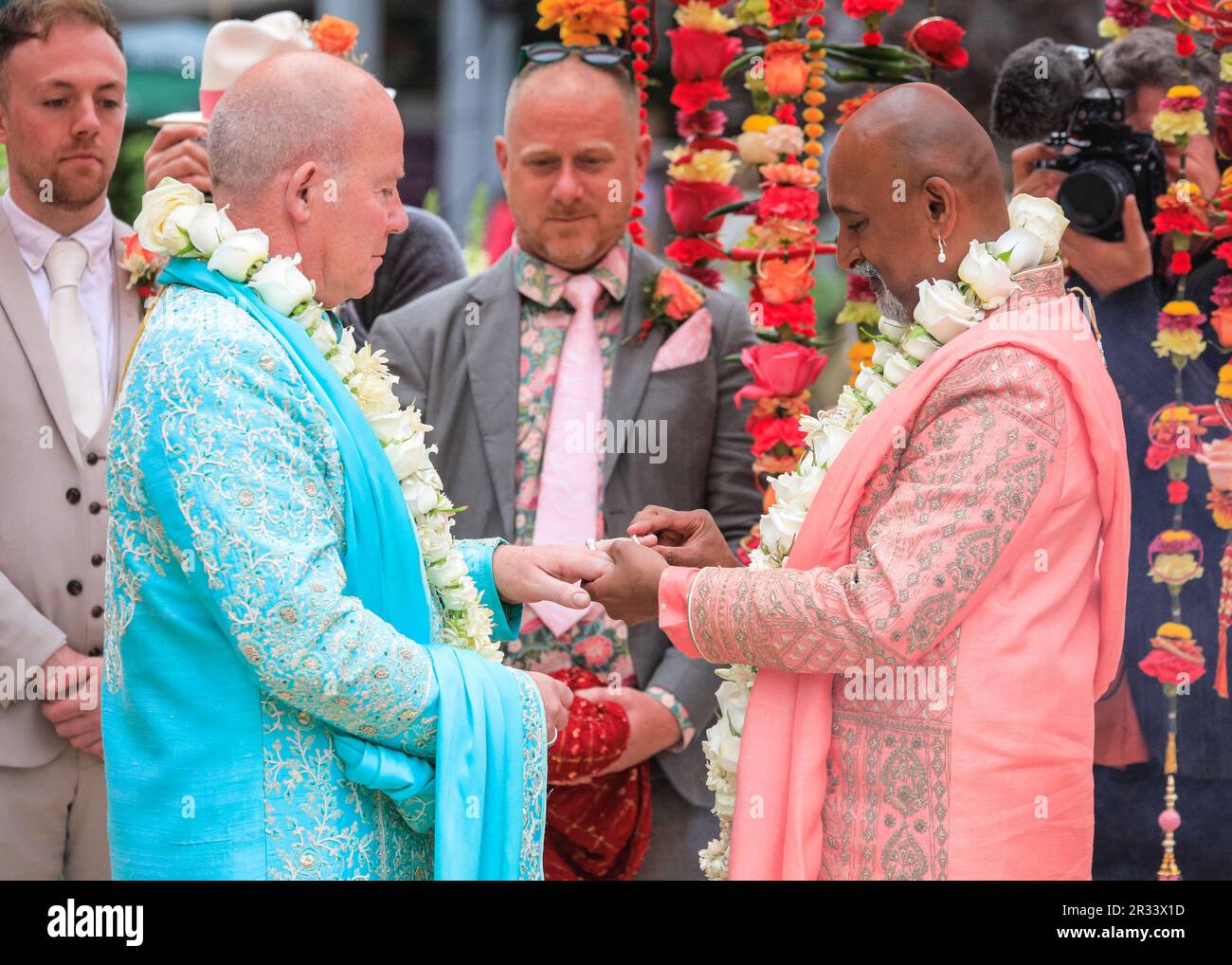 London, UK. 22nd May, 2023. Newlyweds, Manoj Malde and Clive Gillmor ...