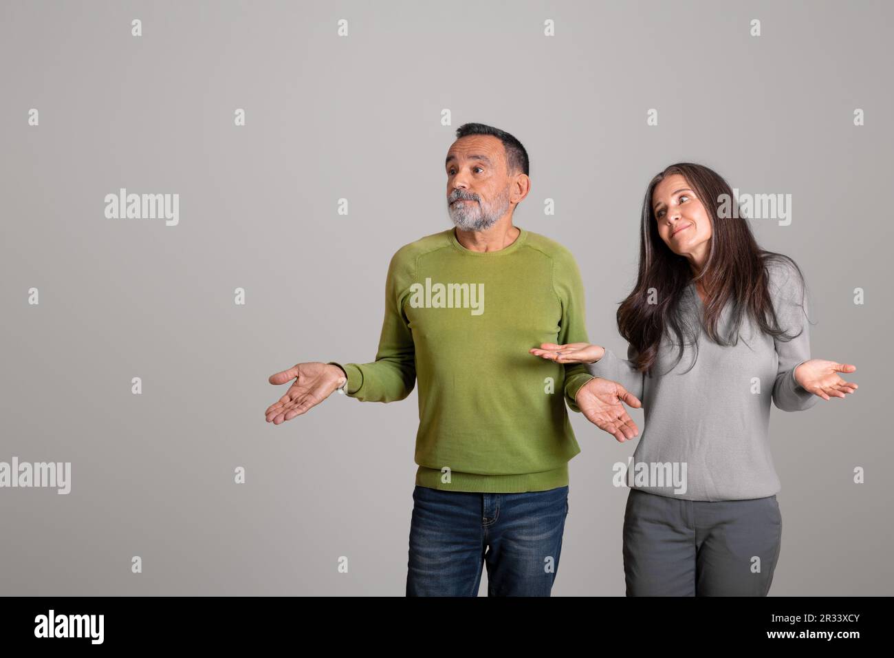 Confused sad pensive caucasian aged husband and wife do not know what ...