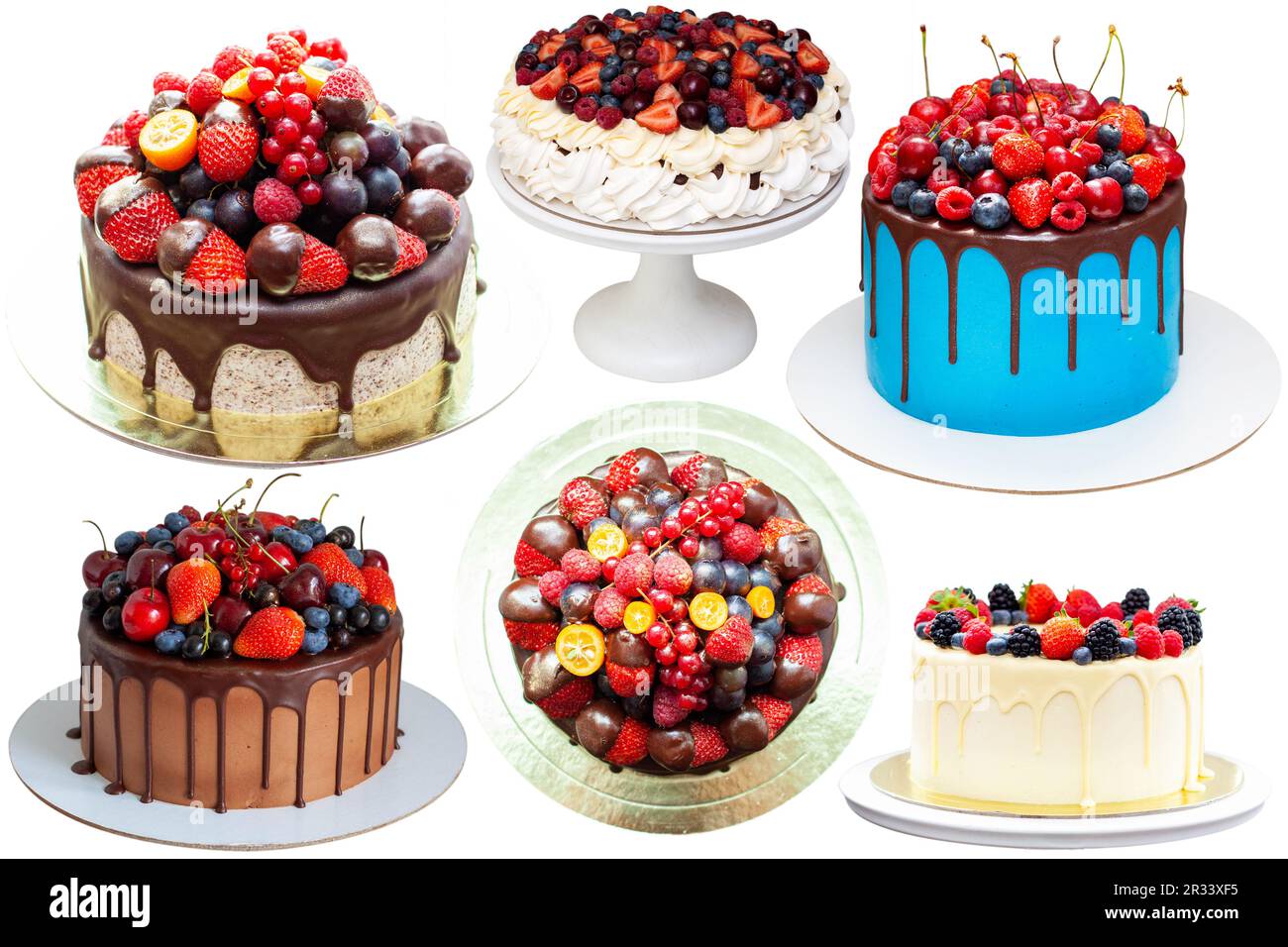 Set of different chocolate and vanilla berry cakes decorated with fresh ...
