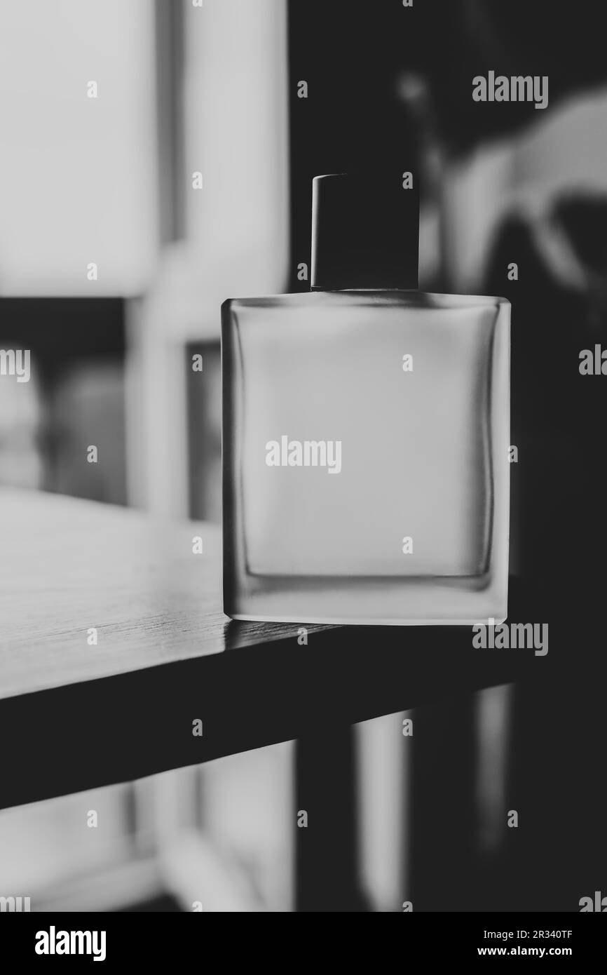 Woman spray perfume Black and White Stock Photos & Images - Alamy