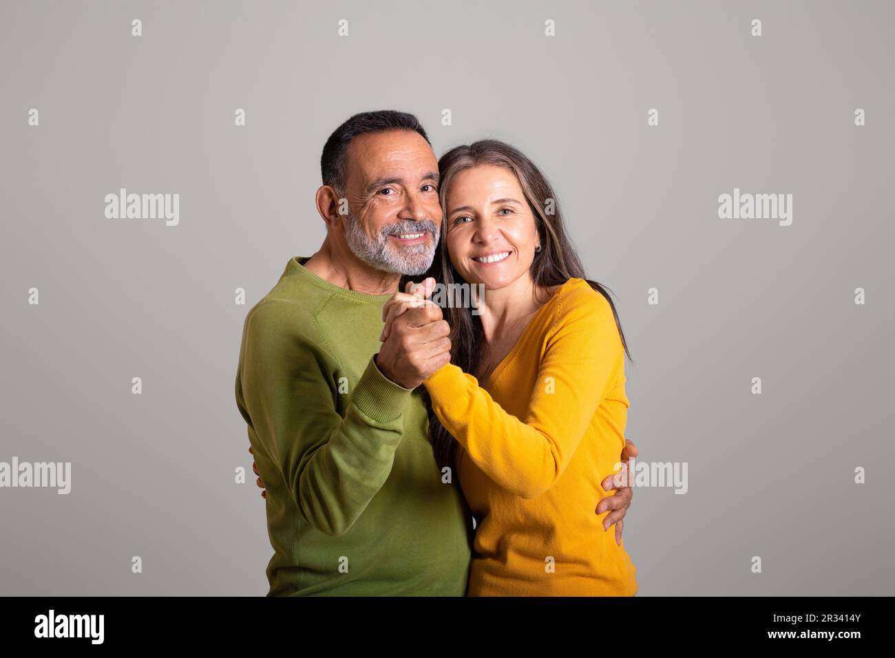 Smiling caucasian aged couple dancing, have fun together, isolated on ...
