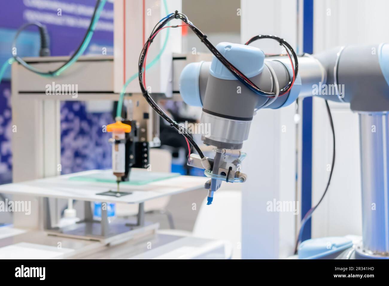 Pick and place robotic arm manipulator during work at modern robot ...