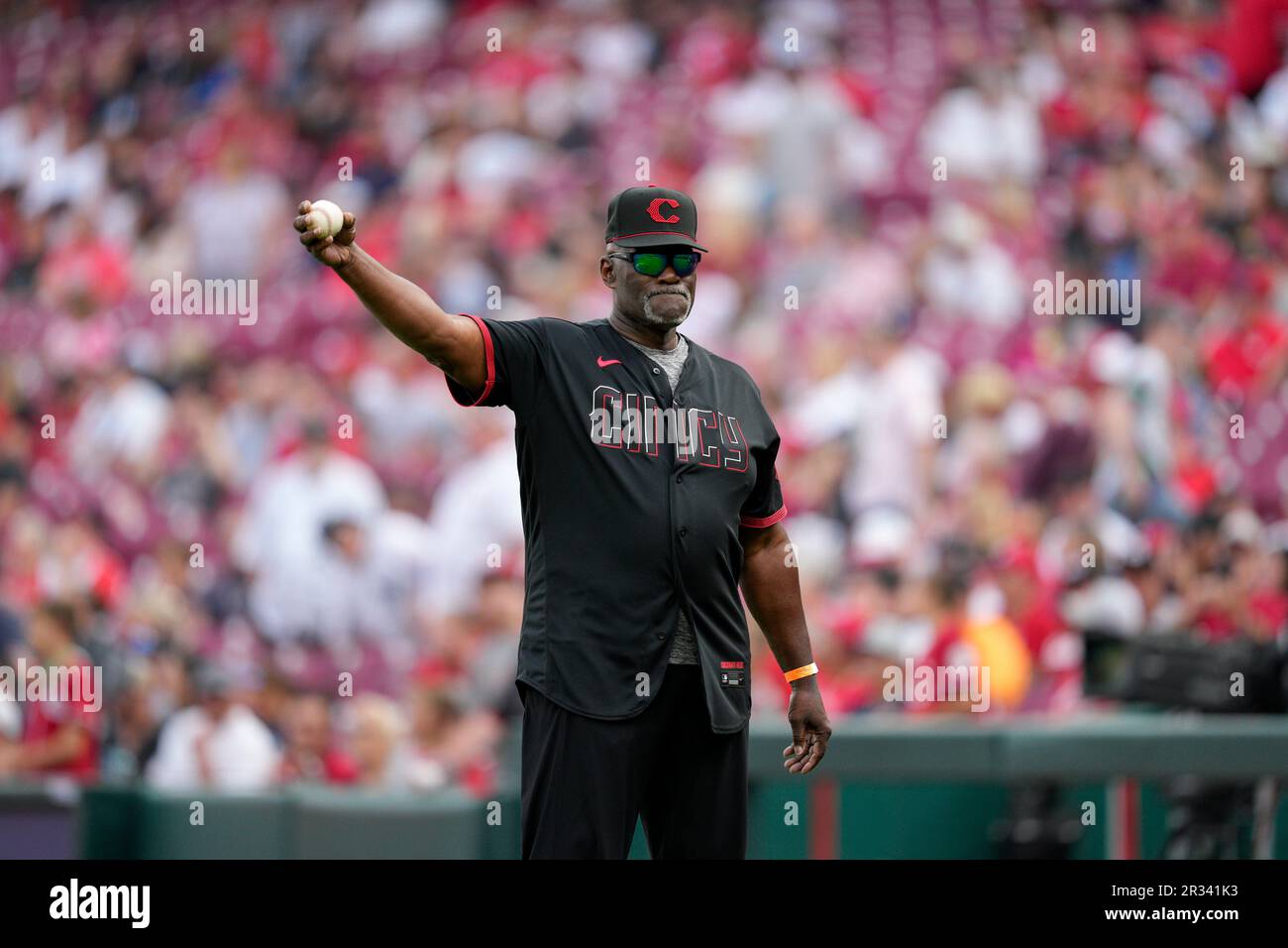 Reds Hall of Famer George Foster prepares to throw the first pitch ...