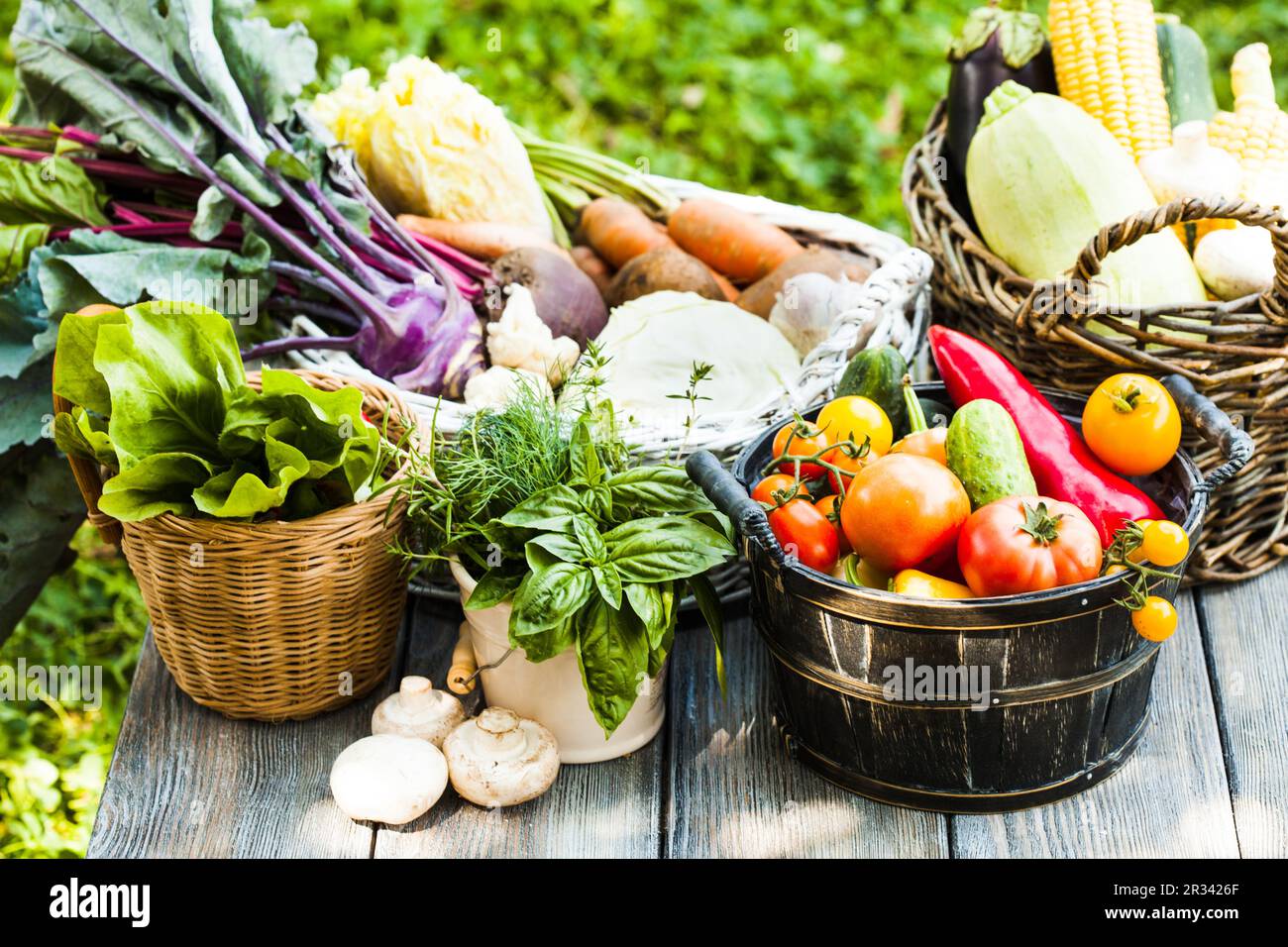 Vegetables on wooden table Stock Photo - Alamy