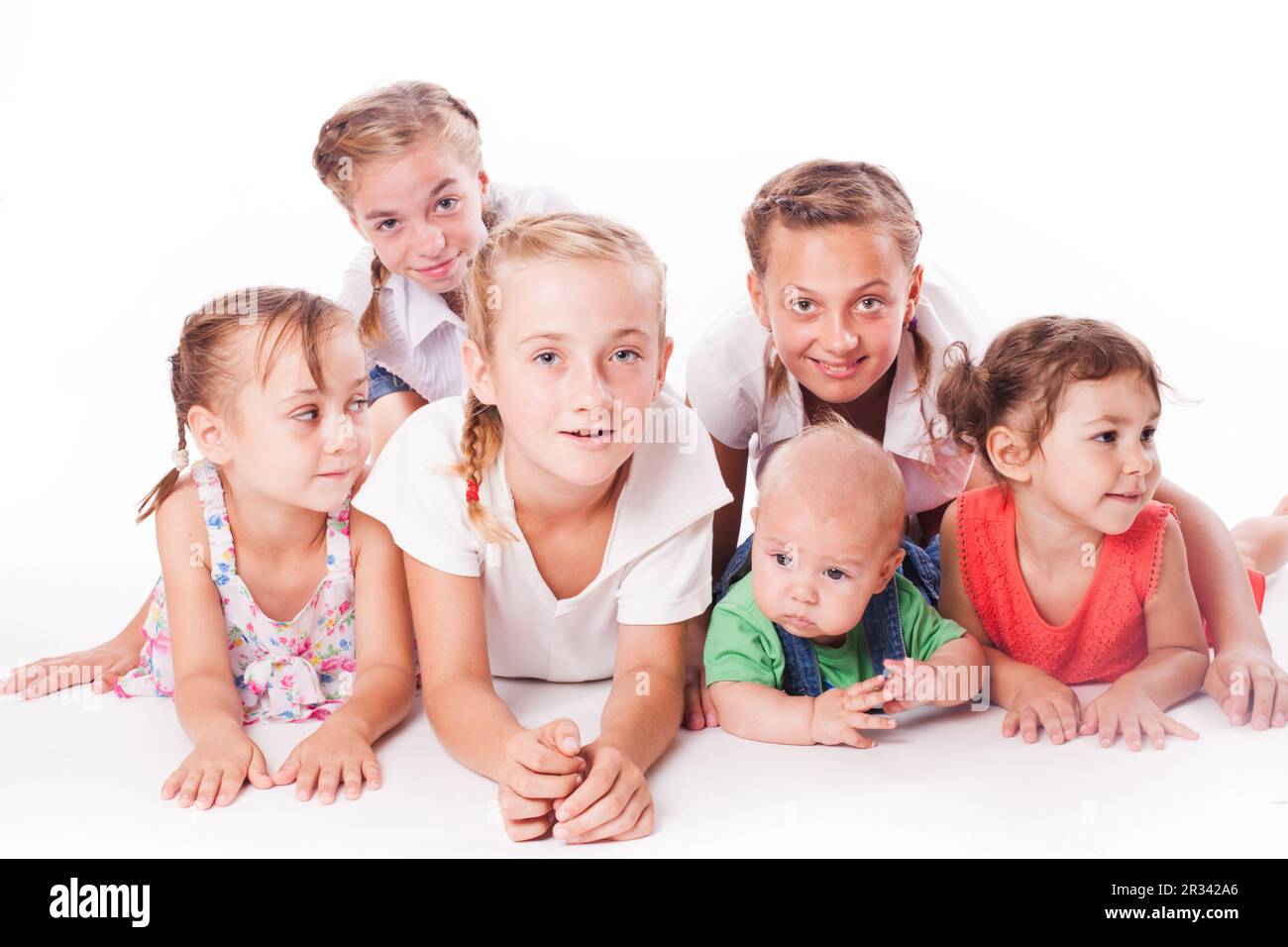 Group happy children different ages hi-res stock photography and images ...