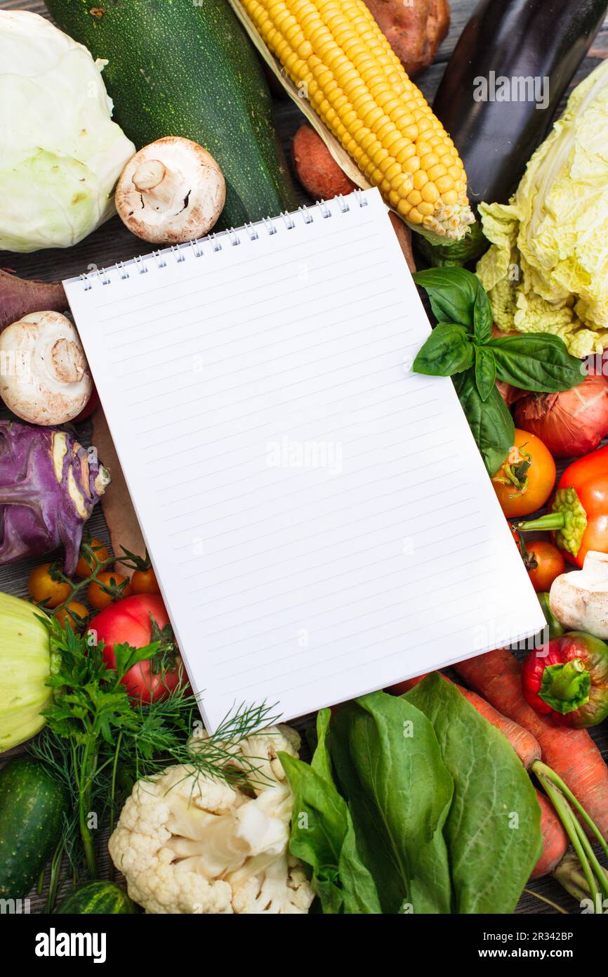 Vegetables on wooden table Stock Photo - Alamy