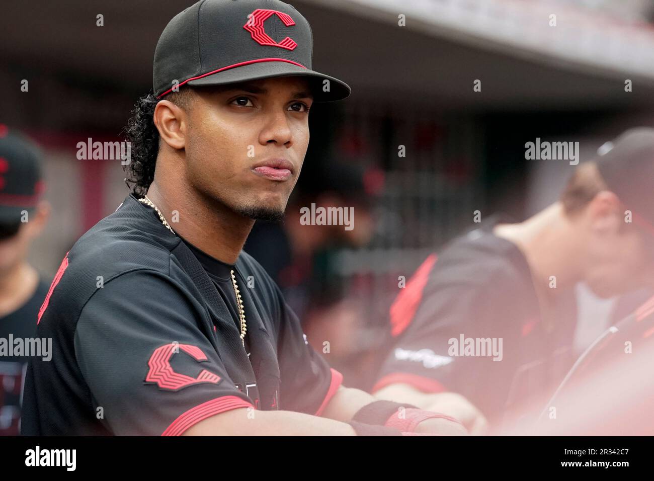 Cincinnati Reds' Jose Barrero stands in the dugout during a baseball ...