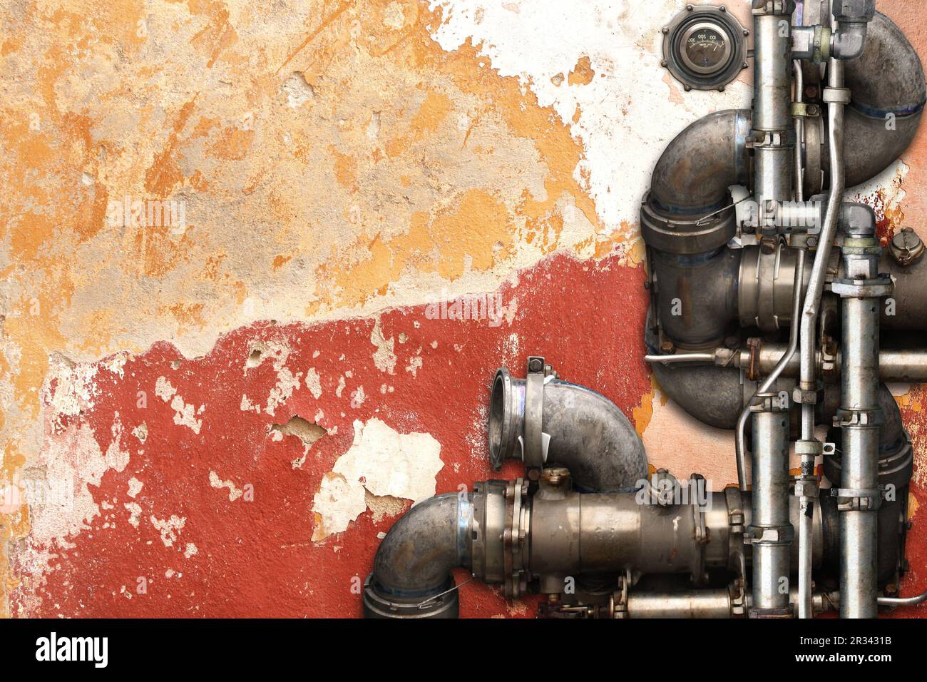 Vintage steampunk backdrop with pipes on stucco wall. Open space with ...