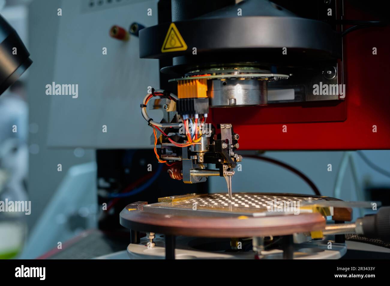 Automatic desktop wire bonder at exhibition Stock Photo - Alamy