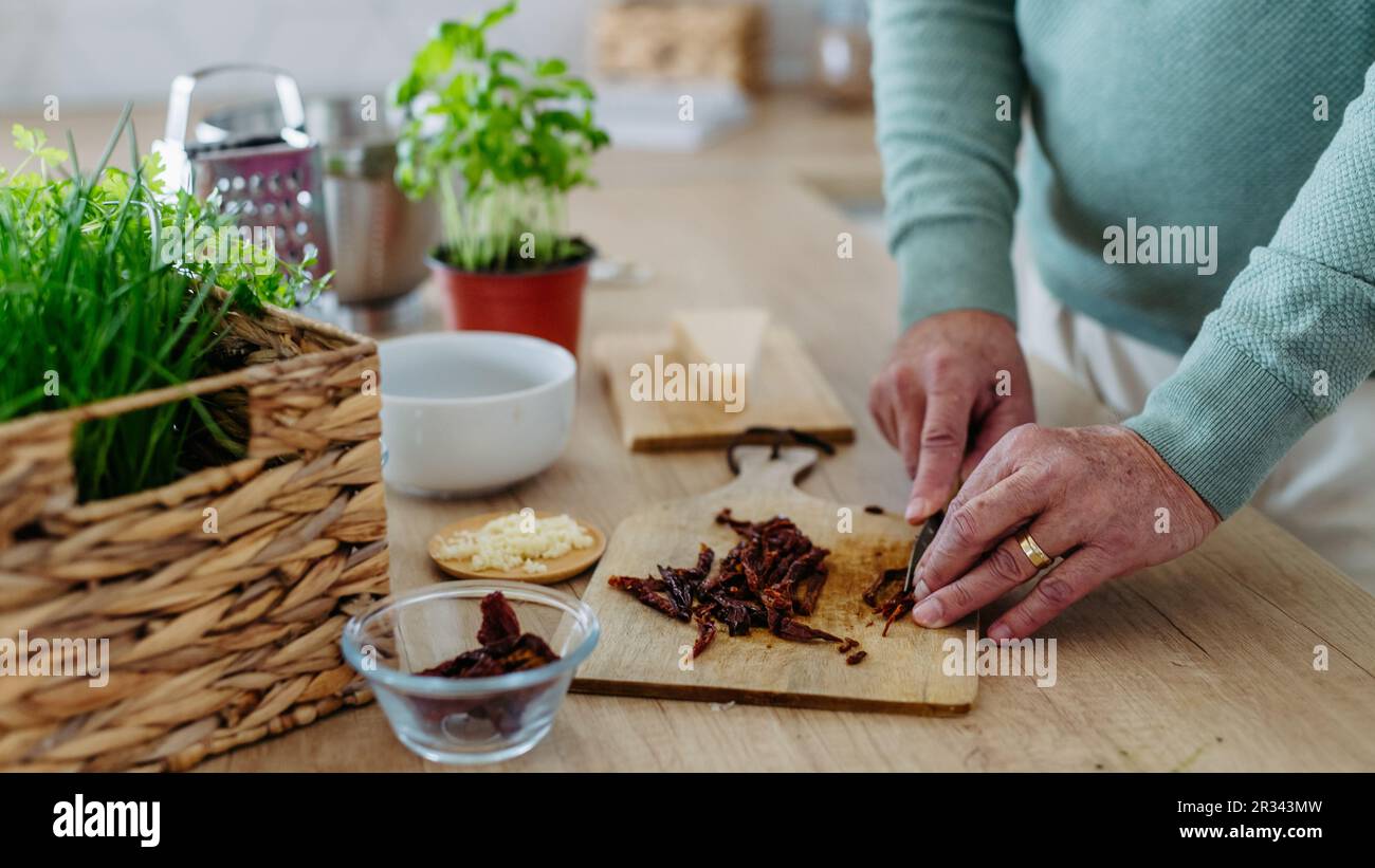 Unrecognizable senior man cutting hi-res stock photography and images ...