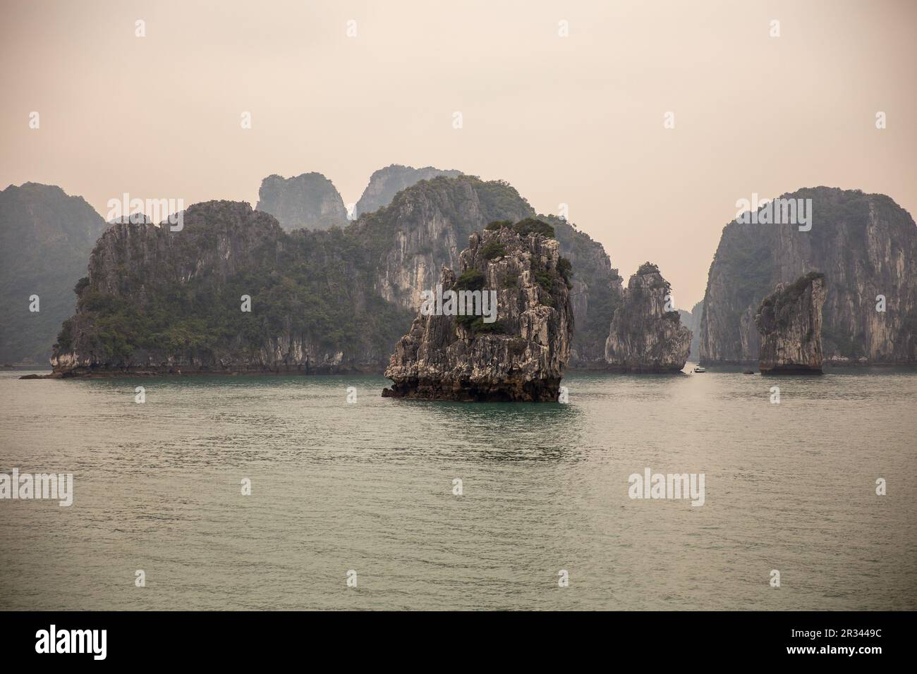 Halong bay cliffs on a overcast day Stock Photo - Alamy
