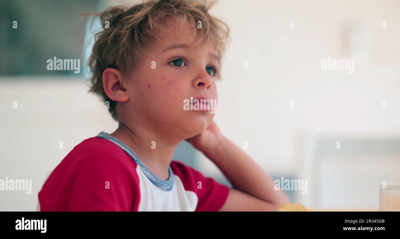 Pensive child boy face thinking. Contemplative thoughtful toddler lost ...