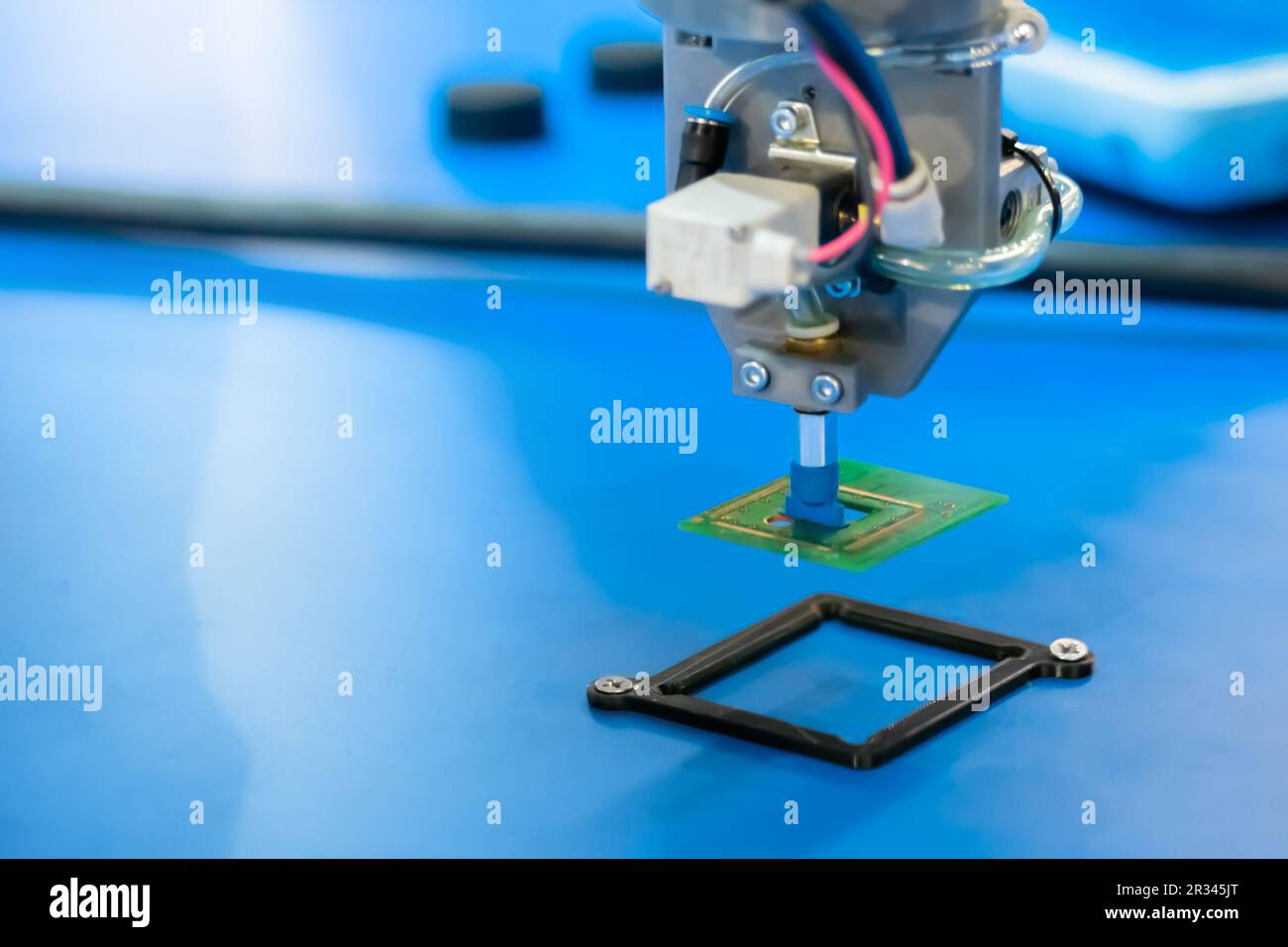 Pick and place robotic arm manipulator during work at modern robot ...