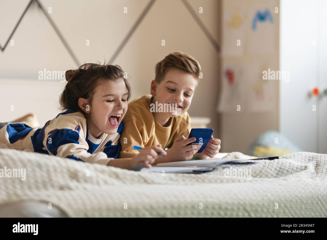Boy math homework calculator hi-res stock photography and images - Alamy