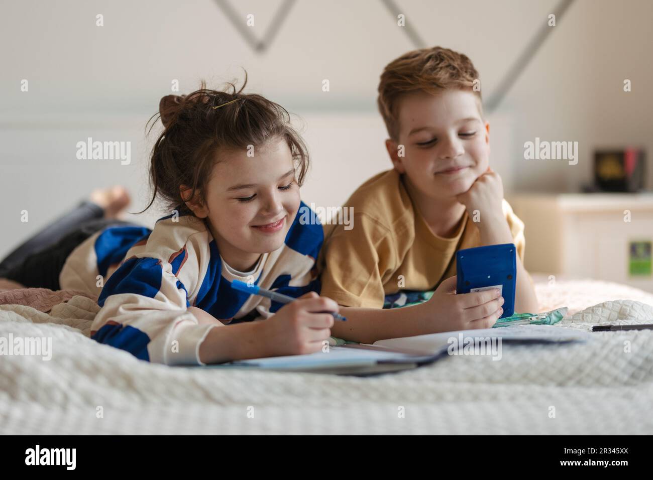 Boy math homework calculator hi-res stock photography and images - Alamy